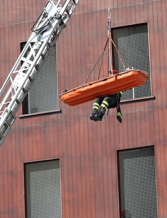 Firemen during a rescue stock photo. Image of crane - 149110348