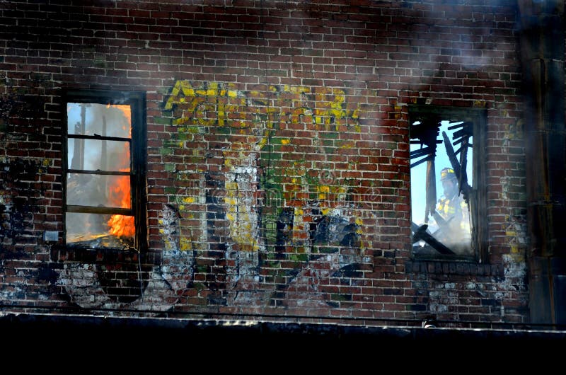 Firemen in Window Fighting Fire Stock Photo - Image of helmets, ignite ...