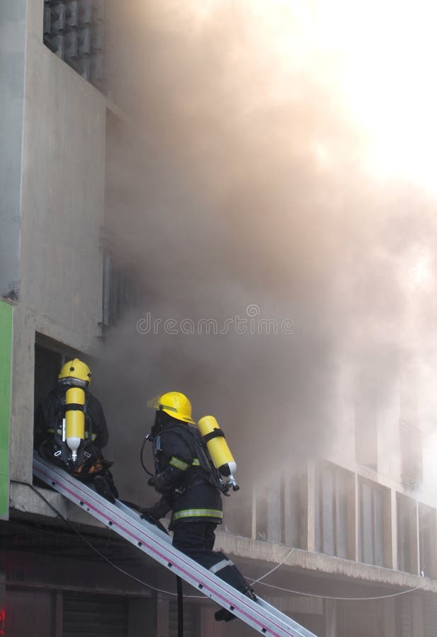 Firemen at work editorial photo. Image of burning, haze - 62385626