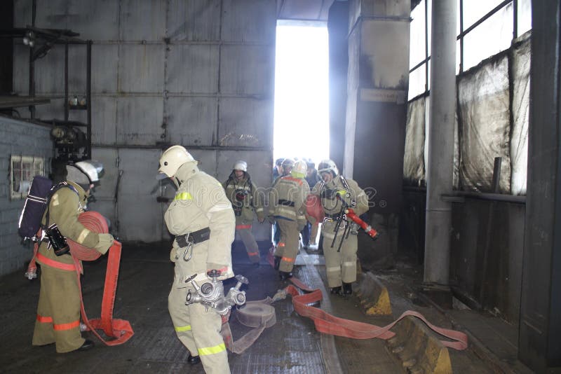 Firemen at work editorial stock photo. Image of doctrines - 126593373