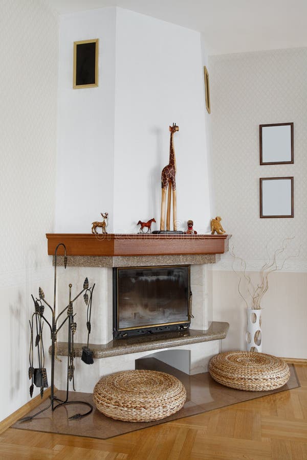 Fireplace Area with Seating Places Stock Photo - Image of statuette ...