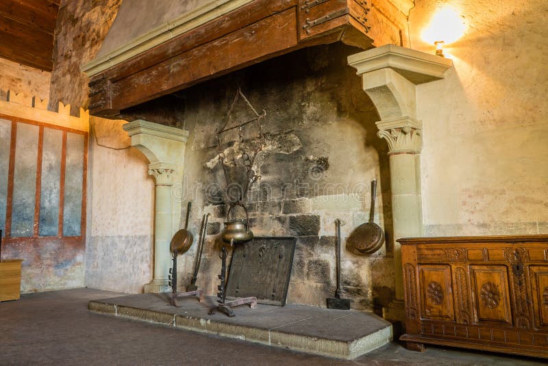 Fireplace in a castle editorial stock image. Image of wood - 104705064