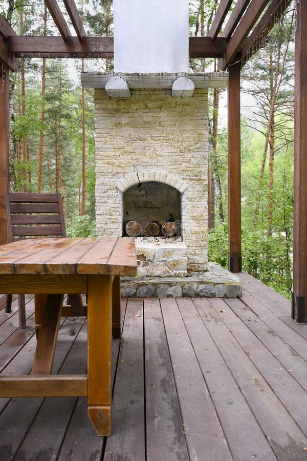 Fireplace with Firewood in the Forest with Pine Trees Stock Image ...