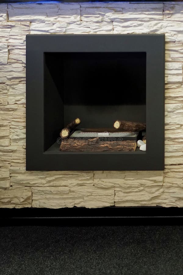 Fireplace with fake fire stock photo. Image of hearthside - 27534844
