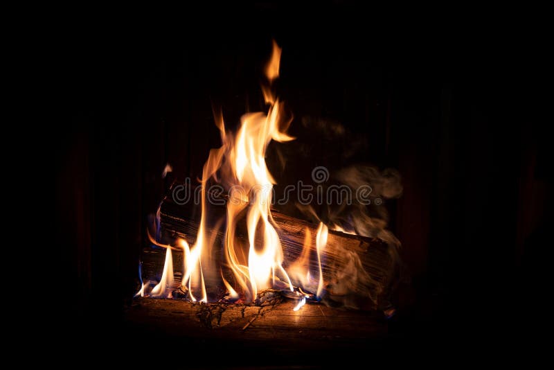 Fireplace with Several Lit Pieces of Fire Stock Image - Image of ...