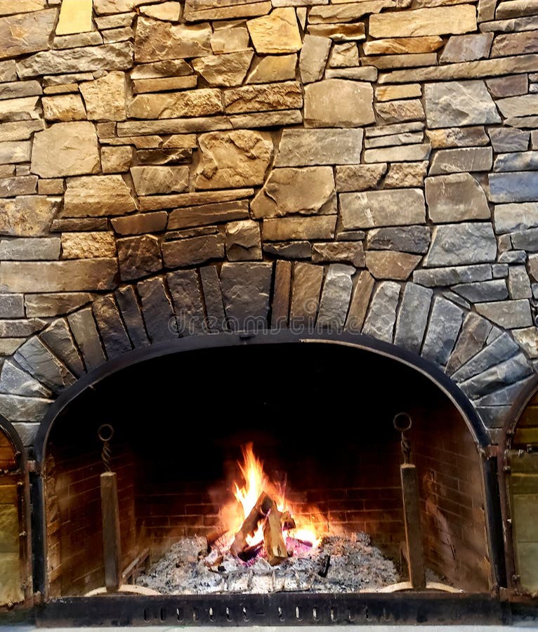 Fireplace stock photo. Image of evening, stone, winter - 140942920
