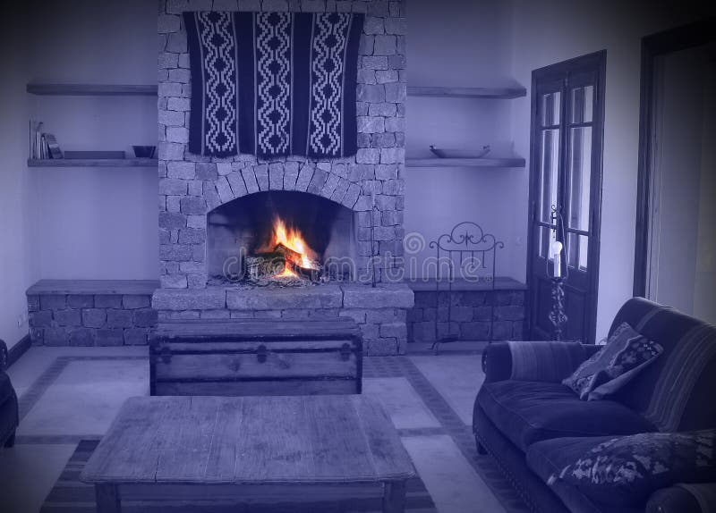 Fireplace of a warm house stock image. Image of ambiance - 593409