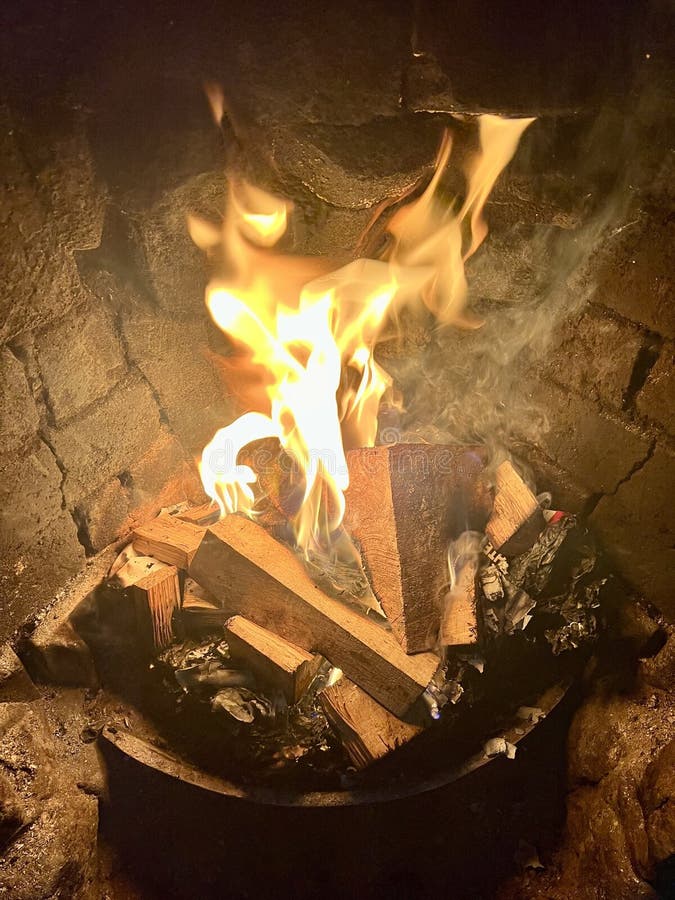 Fireplace with Wood Fire stock image. Image of real - 299862977