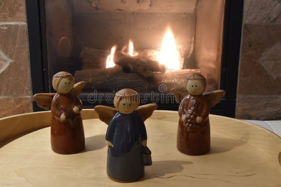 Fireside Angels stock photo. Image of cute, statue, angelic - 90237414