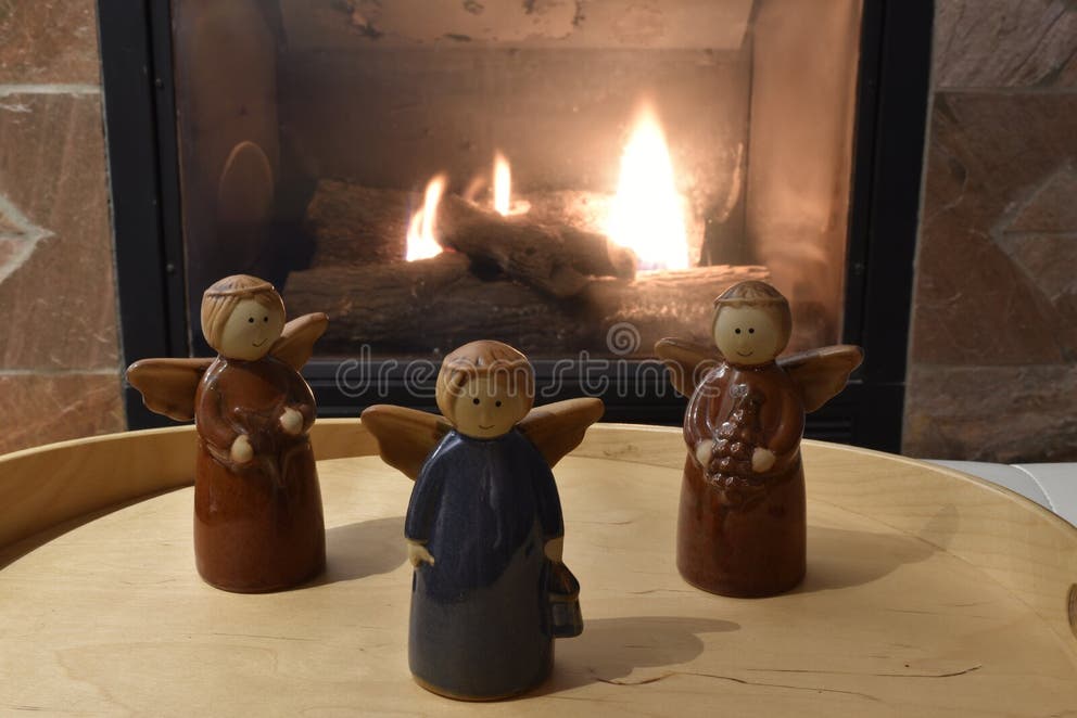 Fireside Angels stock photo. Image of cute, statue, angelic - 90237414