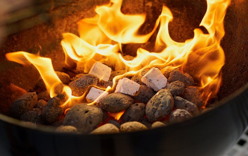 Fireside Fun. Closeup of a Warm Fire Burning in a Barbeque. Stock Image ...