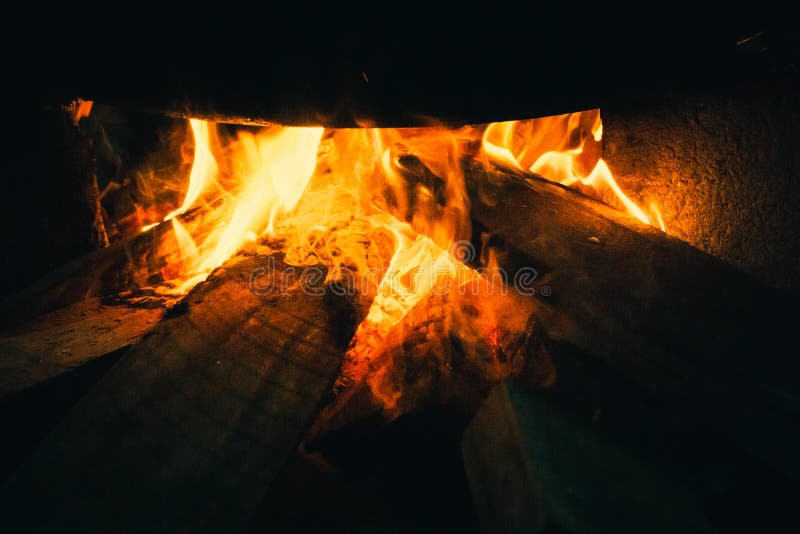 Firewood Burns Inside the Fireplace with Fire and Smoke Stock Photo ...