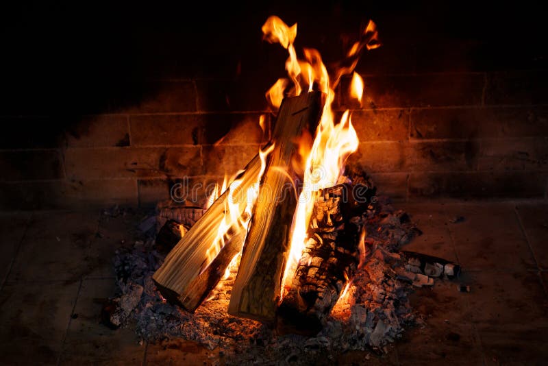 Firewood and a Fire Burning. the Concept of Home Comfort and Warmth ...