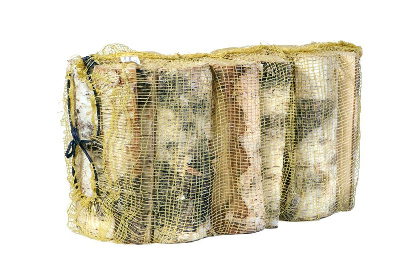 Firewood in packaging net. stock image. Image of white - 60839117