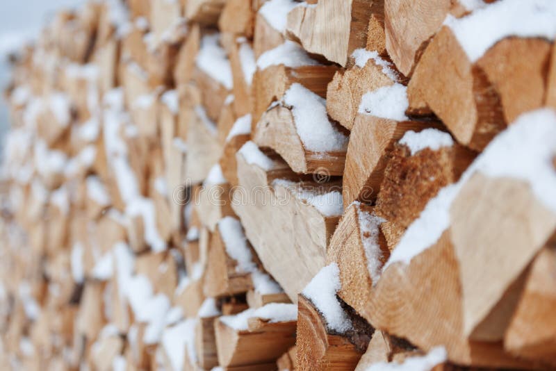 Firewood with Snow Side View Stock Image - Image of country, chipped ...