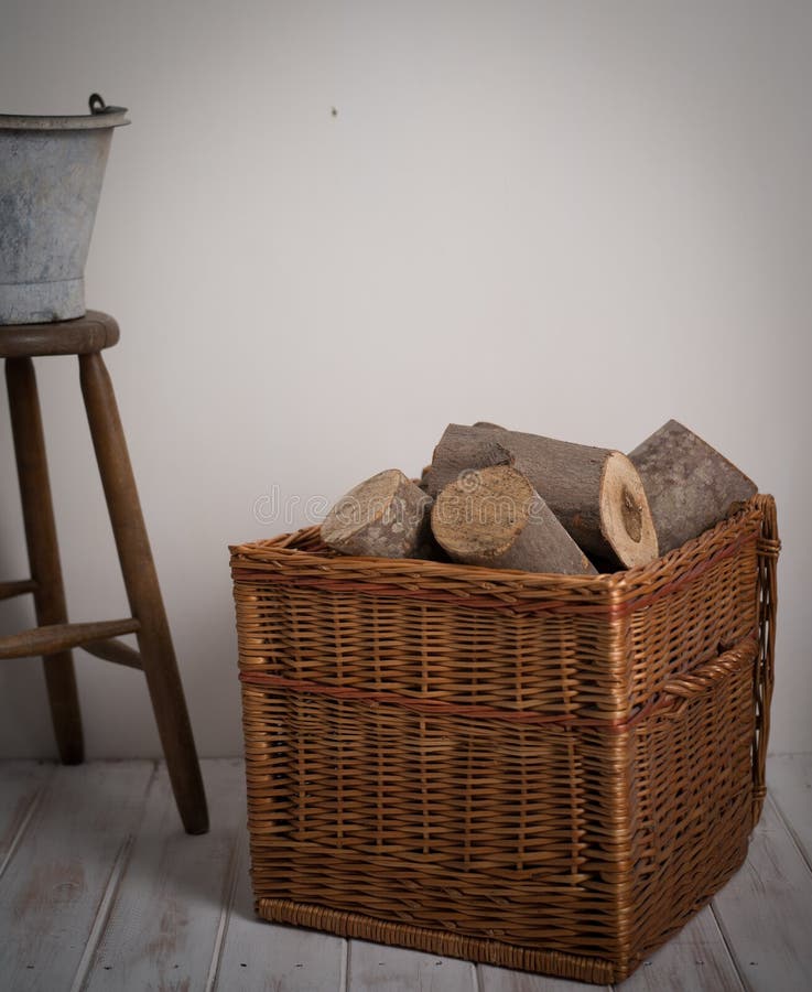 Firewood in a Wicker Basket Stock Photo - Image of rustic, winter: 57303758