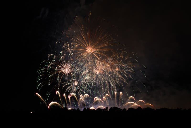 Fireworks in the night sky stock photo. Image of colorful - 171278532