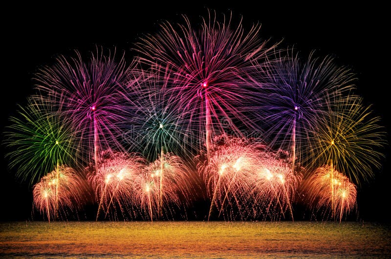 Firework Celebration from the Sea Shore. Stock Photo - Image of night ...