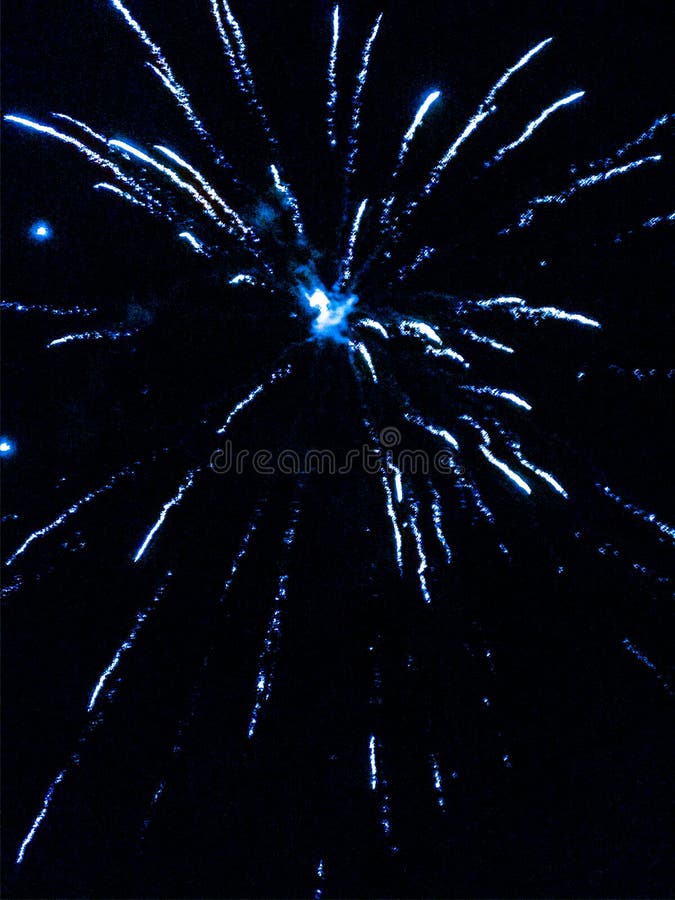 Firework Exploding into Blue Lights Stock Photo - Image of decoration ...