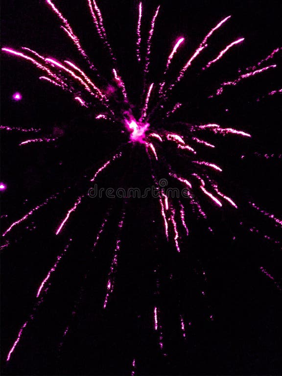 Firework Exploding into Pink Lights Stock Photo - Image of rocket, ball ...
