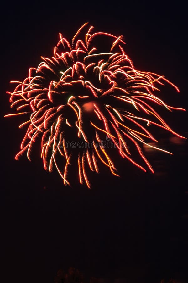 A Firework is Lit Up in the Night Sky Stock Image - Image of night ...