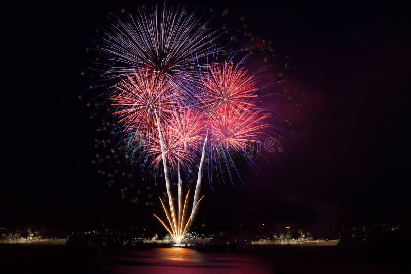 Firework over the water stock photo. Image of glowing - 42994330
