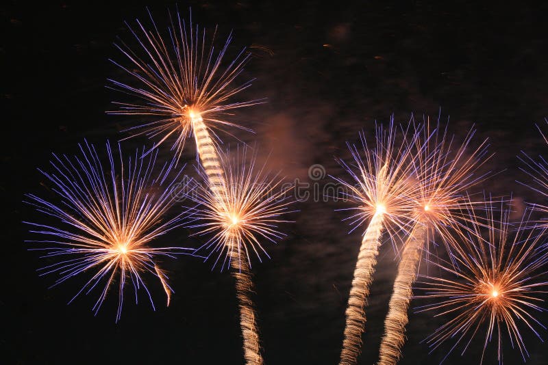 4 Diagonal New Fireworks Rockets with Golden Top Stock Image - Image of ...