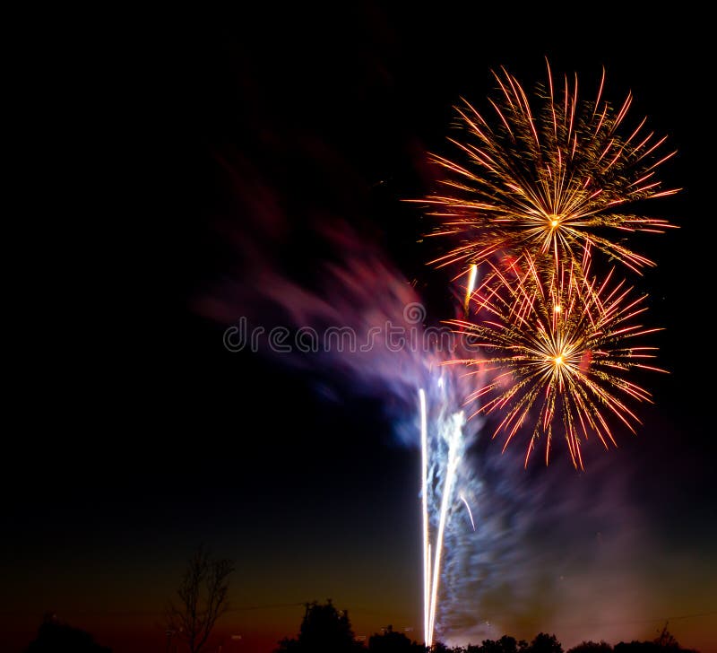 Exploding Fireworks stock photo. Image of glittering, brilliant - 1595522