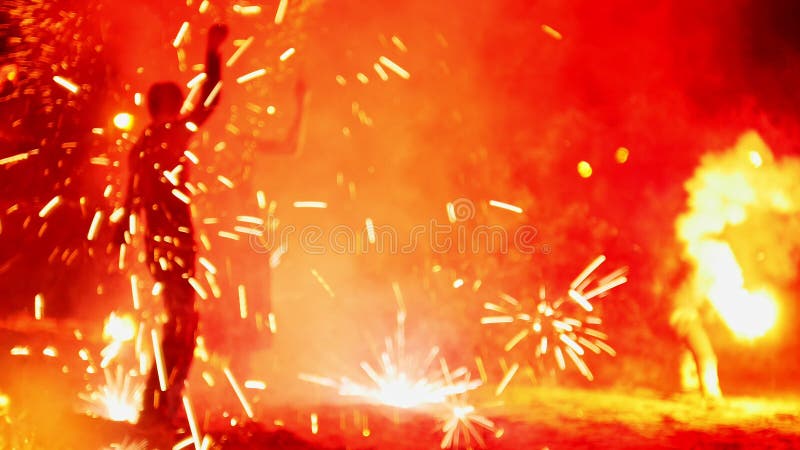 Fire Show Performance - Man and Woman in a Shiny Clothes Playing with ...