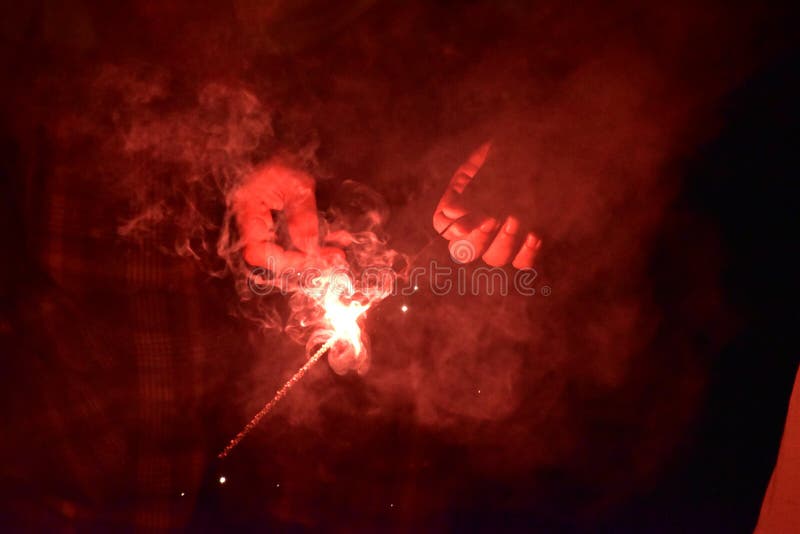 Lighting the fireworks stock photo. Image of festive - 102490478