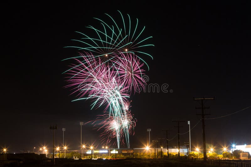 Fireworks Bursting Over Stadium with Brocade Pattern Stock Image ...
