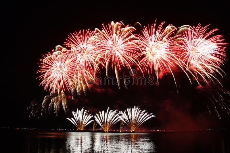 Fireworks bursting stock photo. Image of clouds, firework - 110814010