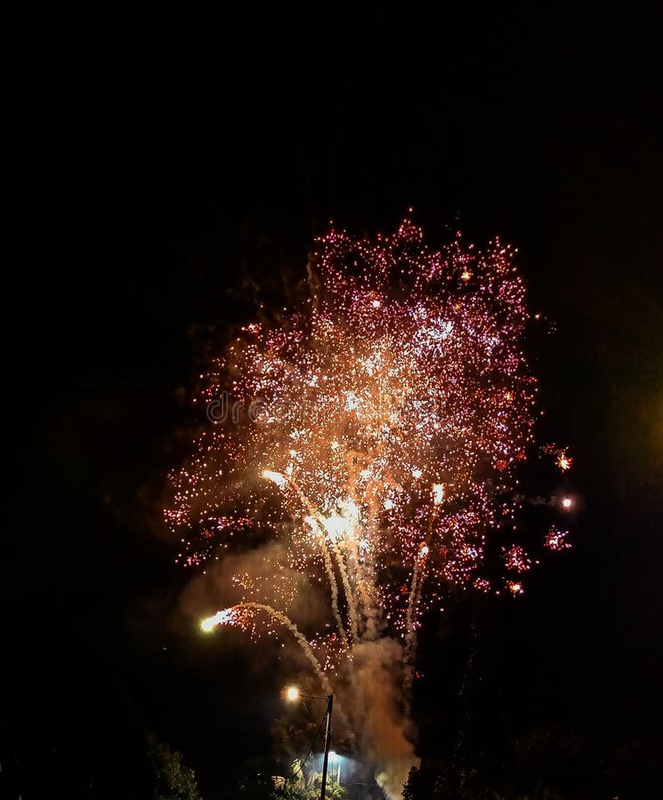 Fireworks during CNY stock image. Image of flower, person - 240787279