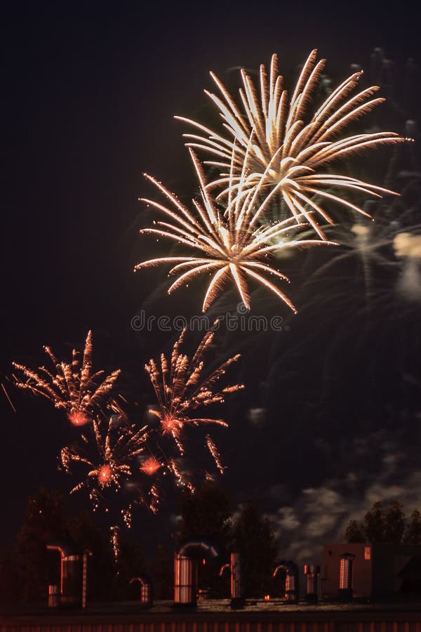 A Fireworks Display is Lit Up in the Night Sky Stock Image - Image of ...