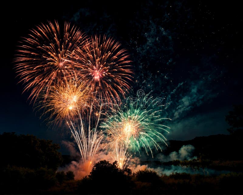 A Fireworks Display in the Night Sky with Three Different Colored ...