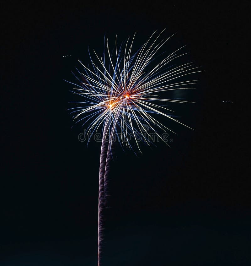 Fireworks Explode in the Dark Sky To Celebrate Stock Image - Image of ...