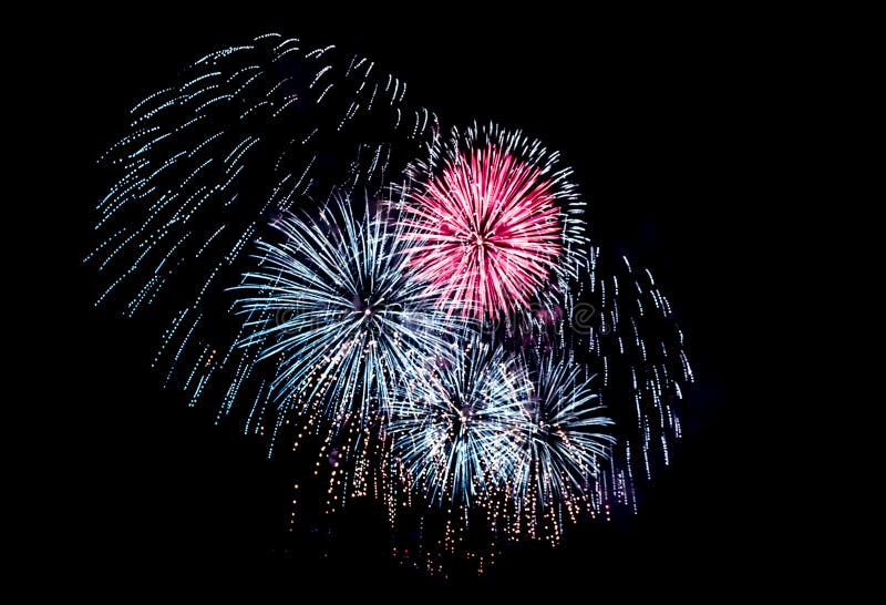 Fireworks Exploding Over the Ocean at Night Stock Photo - Image of ...