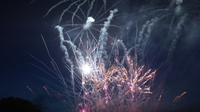 Fireworks Exploding Over the Ocean at Night Stock Photo - Image of ...