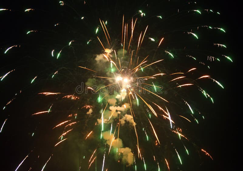 Fireworks Exploding Over the Ocean at Night Stock Photo - Image of ...