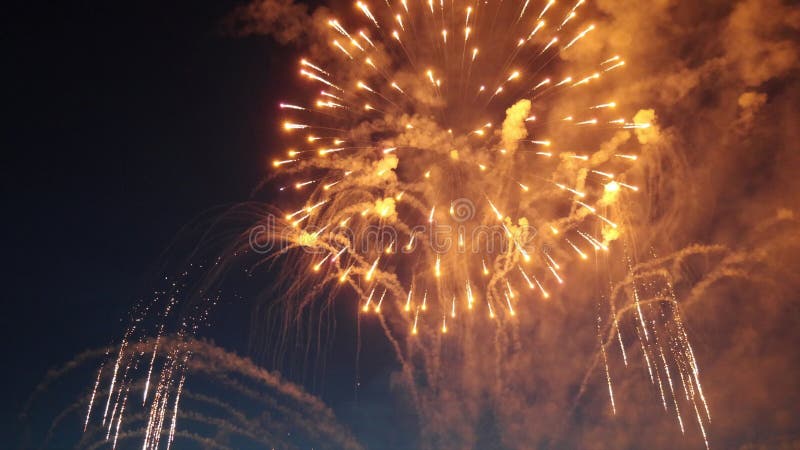 Fireworks Exploding Over the Ocean at Night Stock Photo - Image of ...