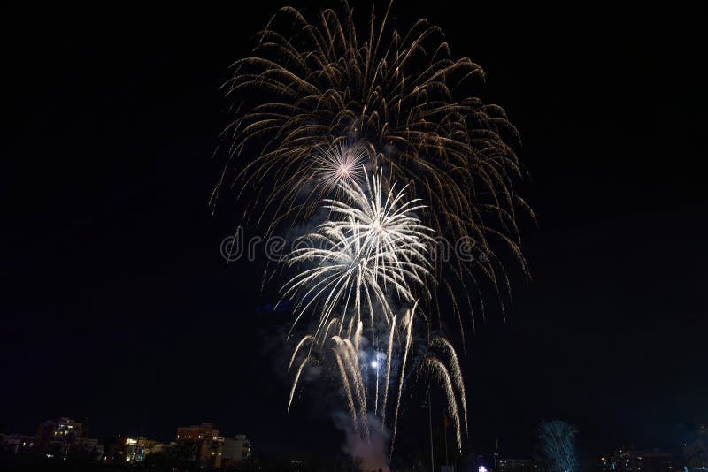 Fireworks Exploding in the Dark Night Sky during a Celebration Stock ...