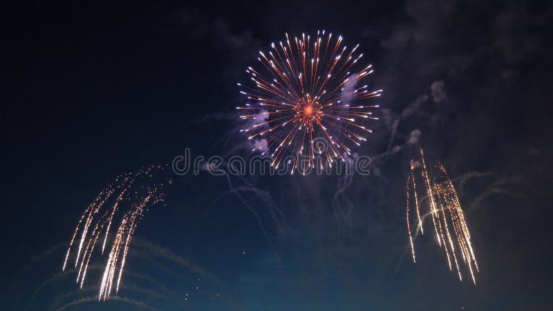 Fireworks Exploding Over the Ocean at Night Stock Photo - Image of ...