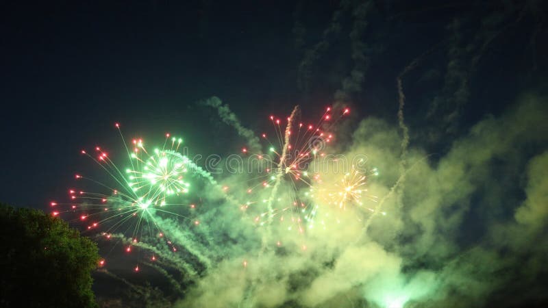 Fireworks Exploding Over the Ocean at Night Stock Photo - Image of ...