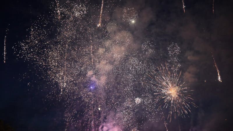 Fireworks Exploding Over the Ocean at Night Stock Photo - Image of ...