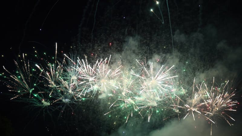 Fireworks Exploding Over the Ocean at Night Stock Photo - Image of ...