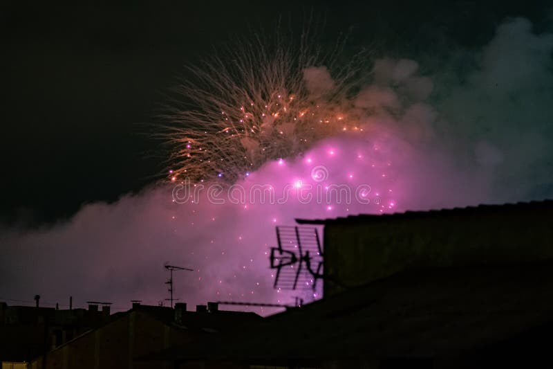 Fireworks Exploding and Shining on a Smoke Cloud Dark Night Scene Stock ...