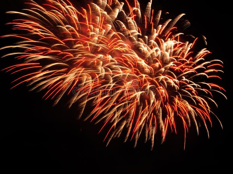 Fireworks Exploding Over the Ocean at Night Stock Photo - Image of ...