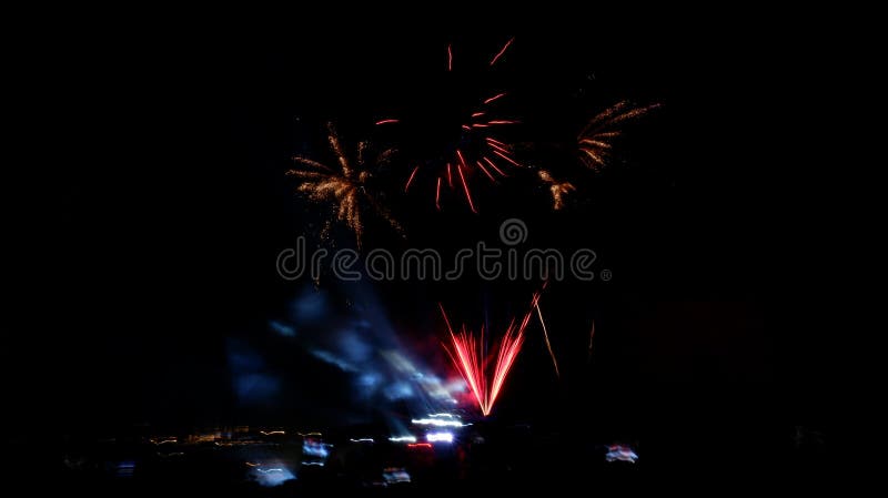 Fireworks Float in the Pitch Black Sky Stock Image - Image of fountain ...