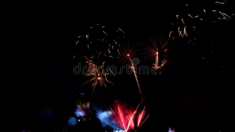 Fireworks Float in the Pitch Black Sky Stock Image - Image of modern ...