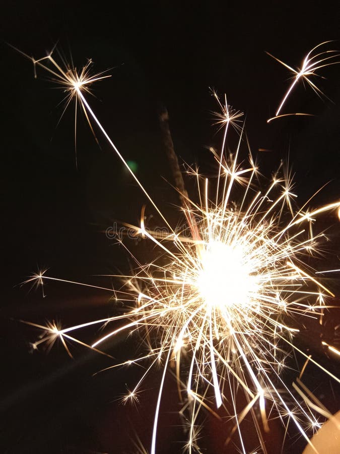 Fireworks go off at night stock photo. Image of gold - 264373762